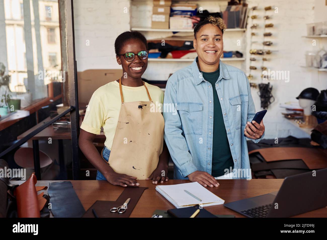 Two business partners posing in hi-res stock photography and images - Alamy