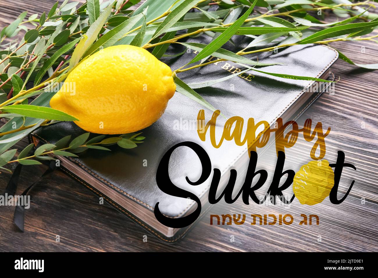 Greeting card with Sukkot festival symbols and Bible on wooden ...