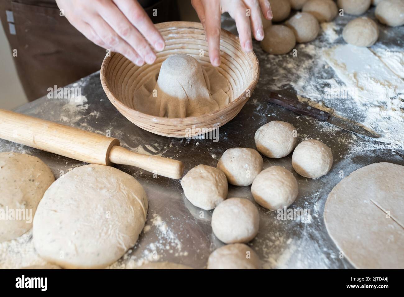 The process of making traditional French bread in a craft bakery ...
