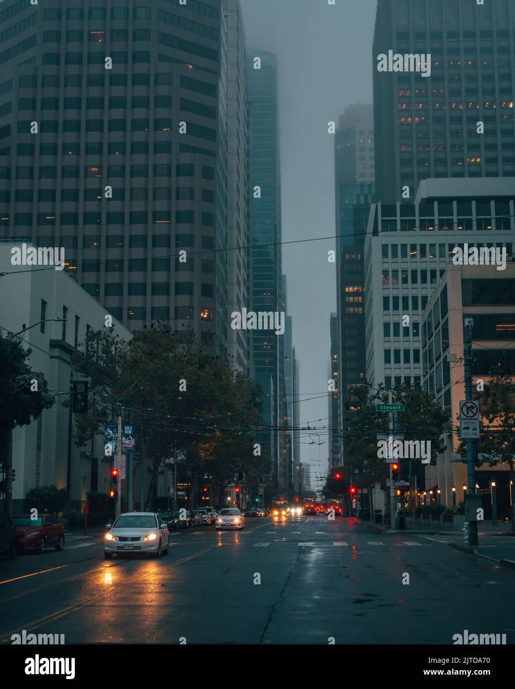 City street on a rainy night in the Embarcadero, San Francisco ...