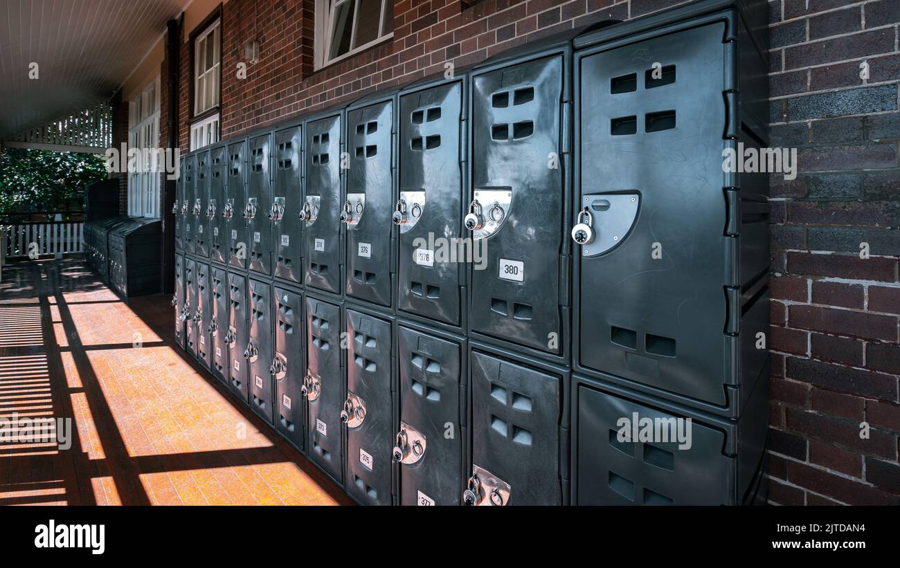 Numbered school lockers with padlocks Stock Photo - Alamy