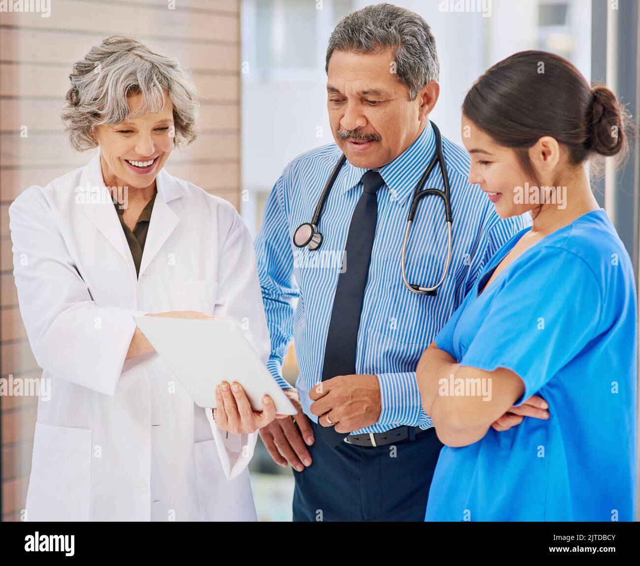 These results are extraordinary. three healthcare professionals looking ...