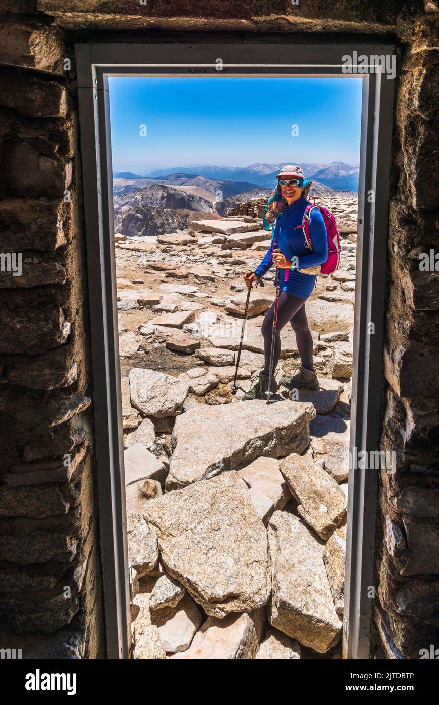 Hiker from inside the summit hut on Mount Whitney, Sequoia National ...