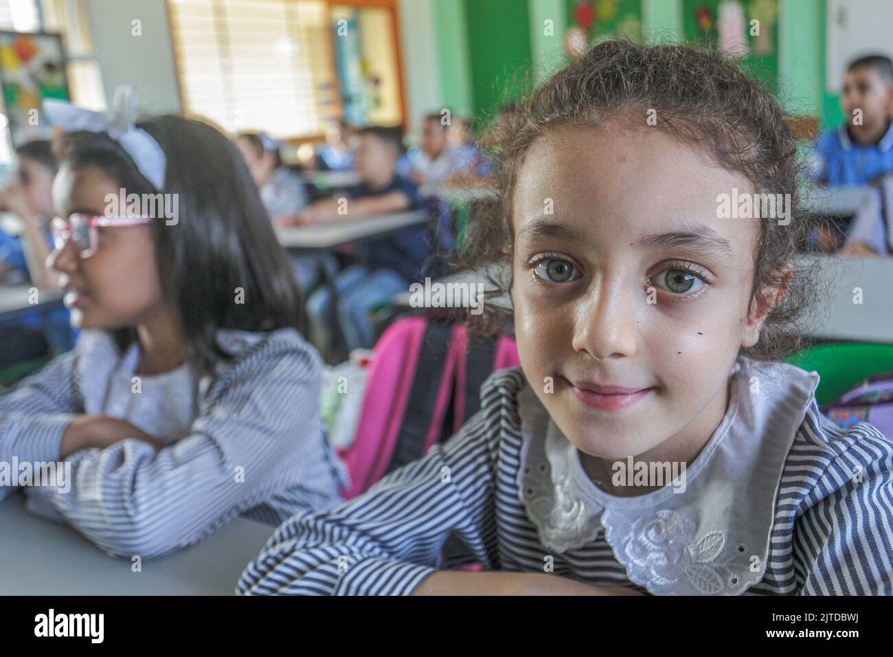 Palestinian girls on the first day of in-person lessons at a public ...
