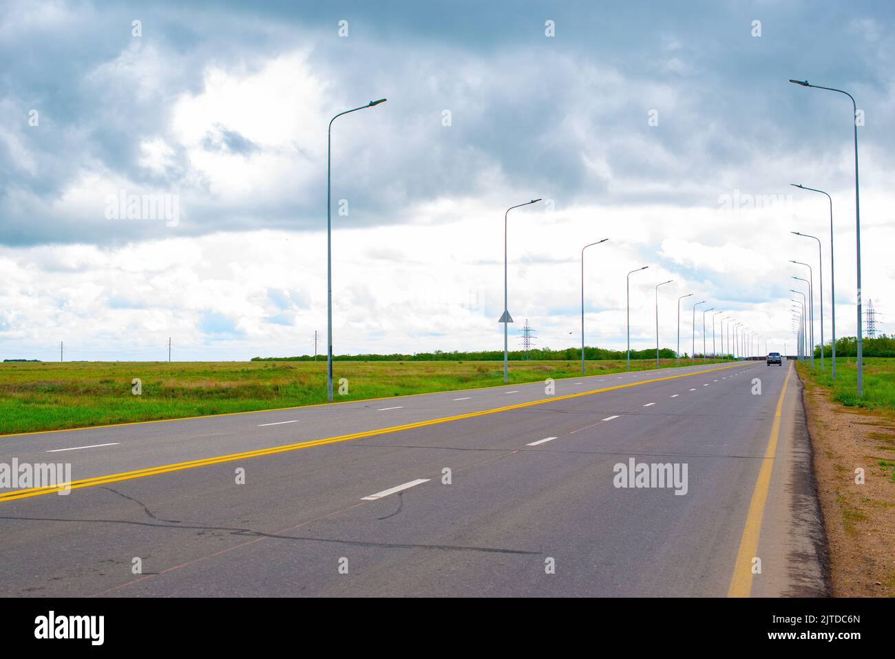 perspective of paved road and sky before rain Stock Photo - Alamy
