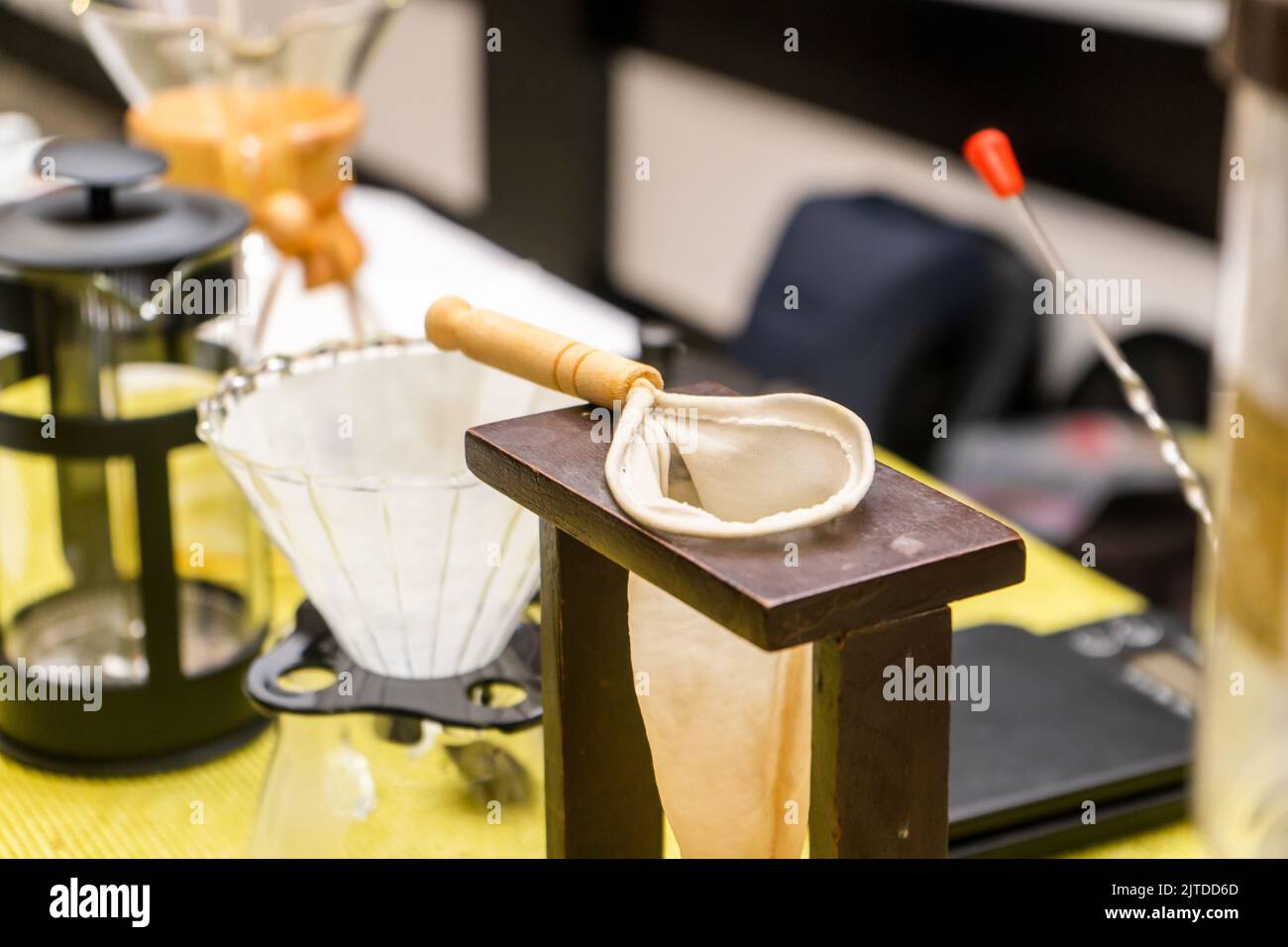 Coffee strainers made of fabric on a display table Stock Photo - Alamy