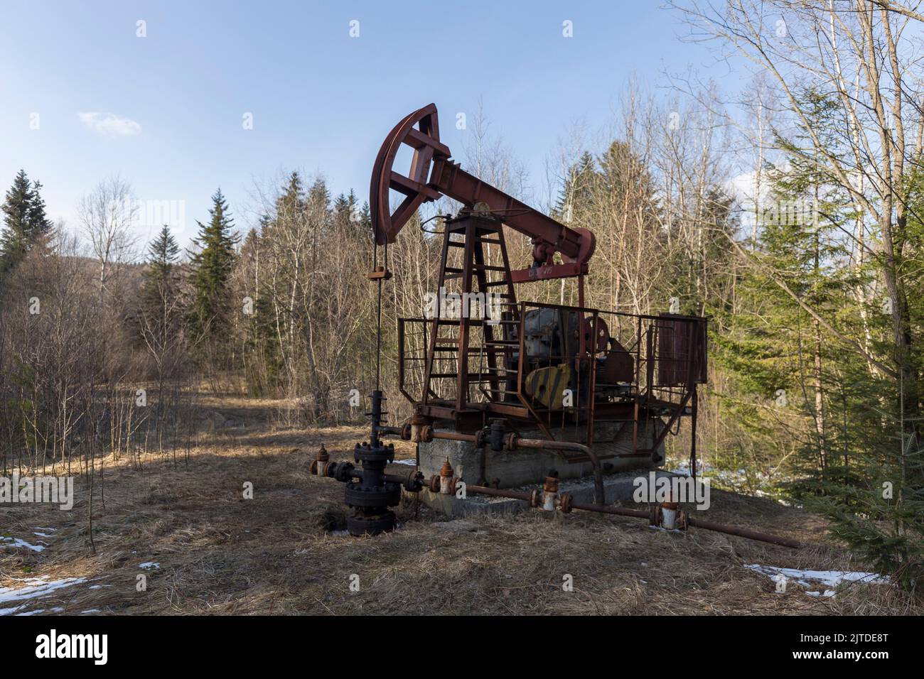 Oil rolling pin. An old oil rolling mill on the outskirts of the city ...