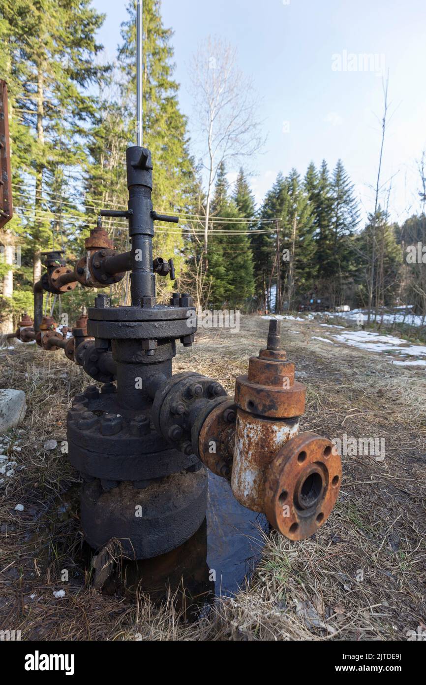 Oil rolling pin. An old oil rolling mill on the outskirts of the city ...