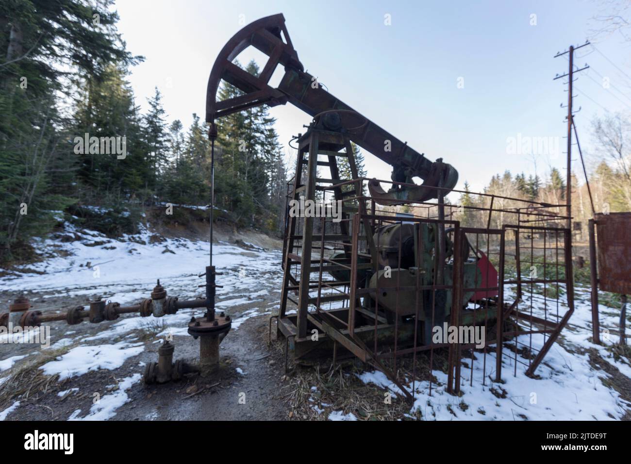 Oil rolling pin. An old oil rolling mill on the outskirts of the city ...
