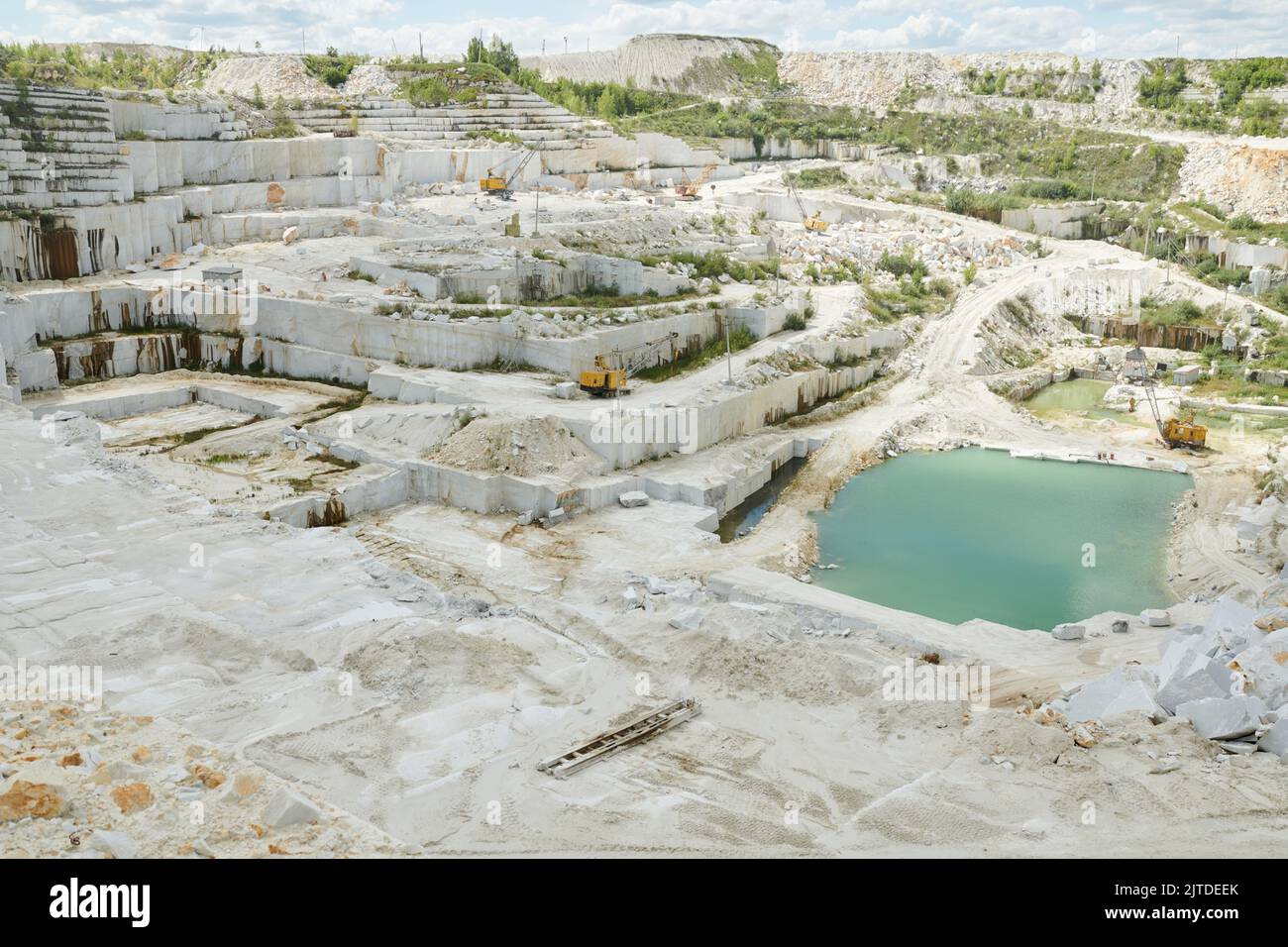 Above view of part of vast territory of modern quarry belonging to ...