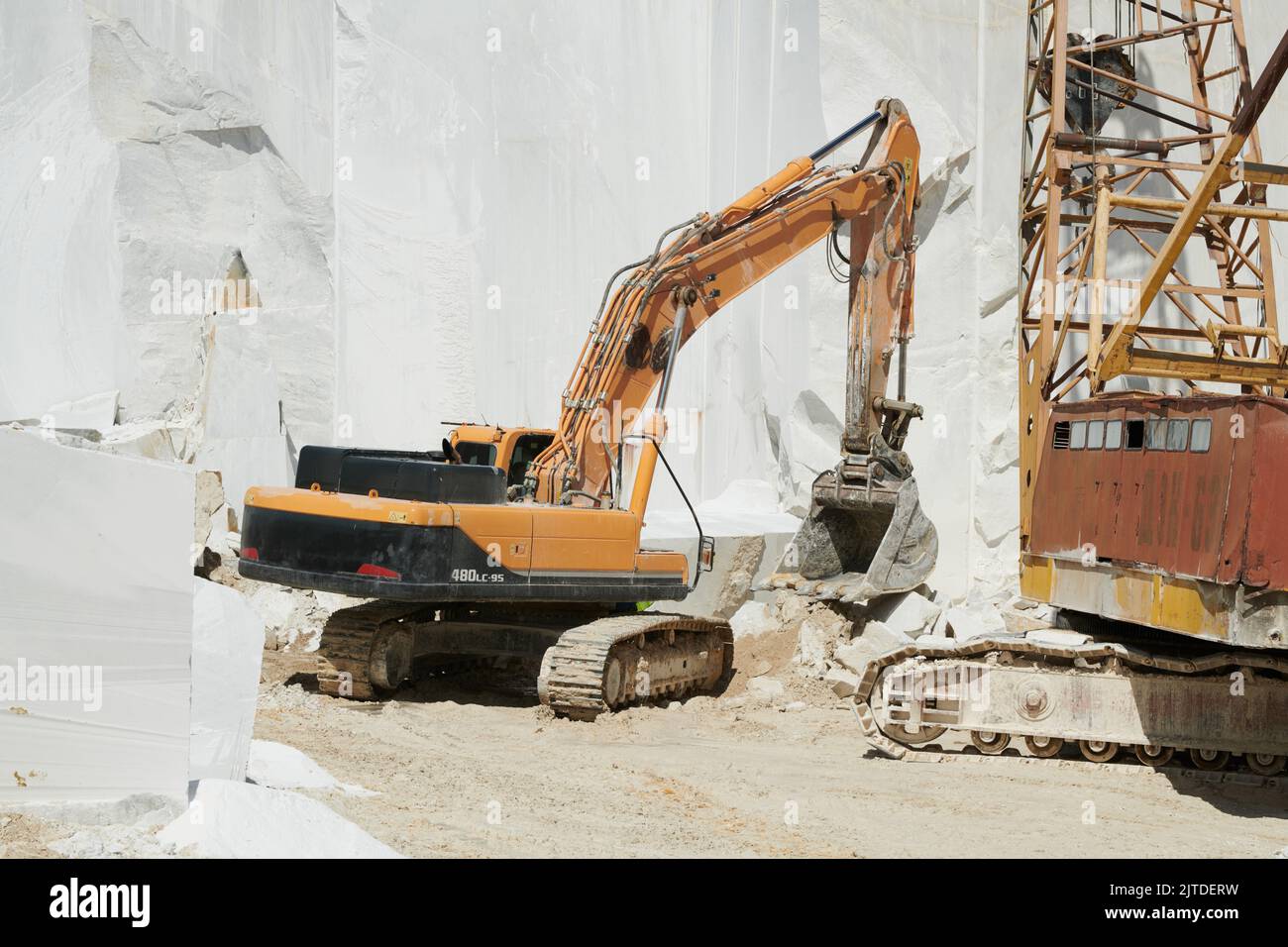 Part of construction site or other industrial area with two caterpillar ...