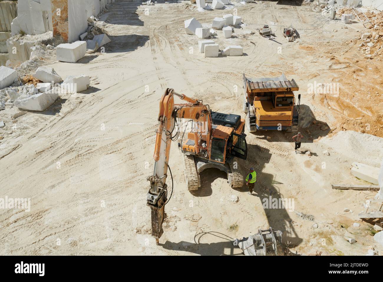 Above angle of dump truck and hydraulic caterpillar construction ...