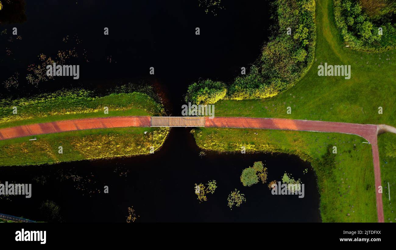 A Bird's - eye view of a bridge spanning across river in the daylight Stock Photo - Alamy
