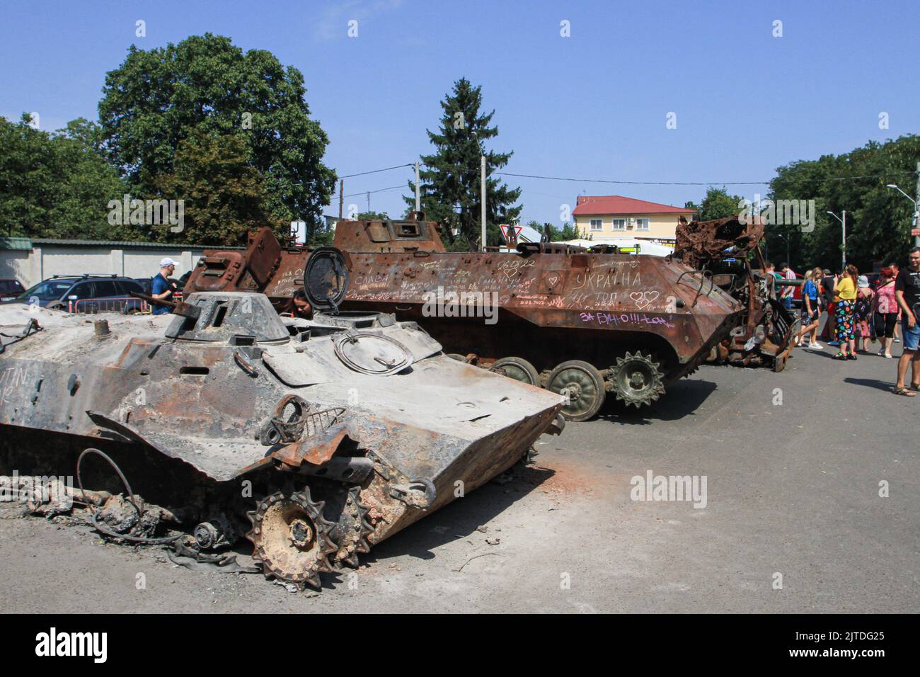 A view of a burned-out MTLB and armored personnel carrier. Units of the ...