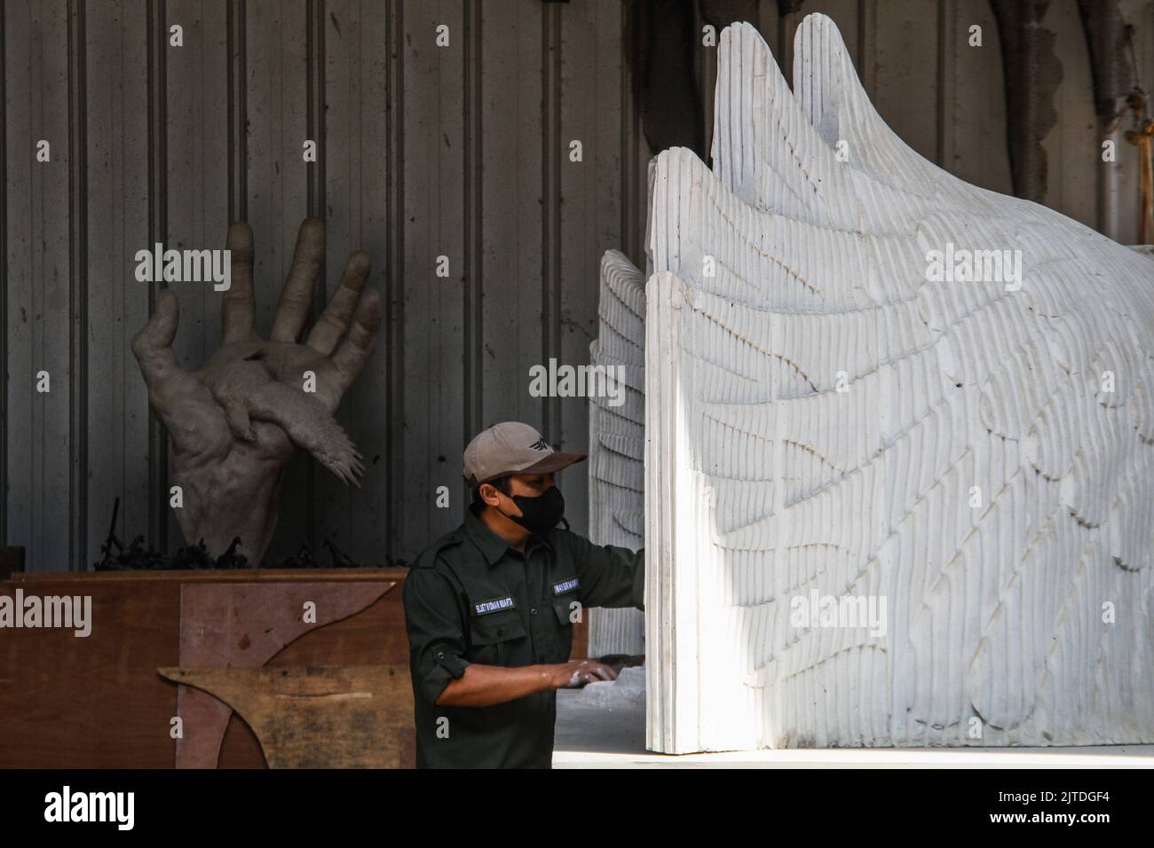 Bandung, West Java, Indonesia. 30th Aug, 2022. Workers sculpted a mock ...