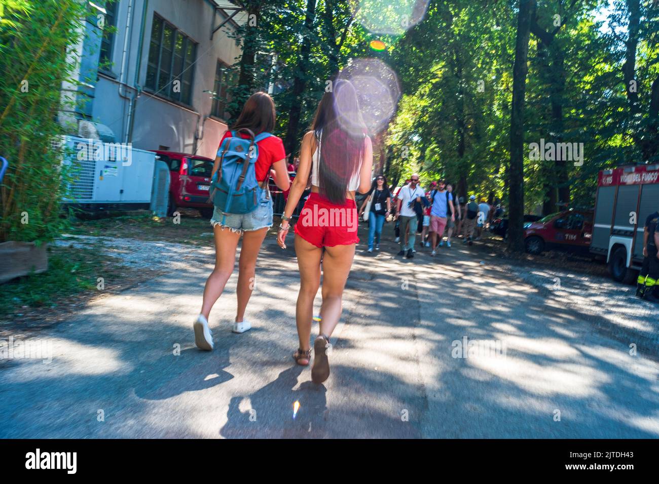 Scuderia Ferrari female supporters walk through the circuit before the ...