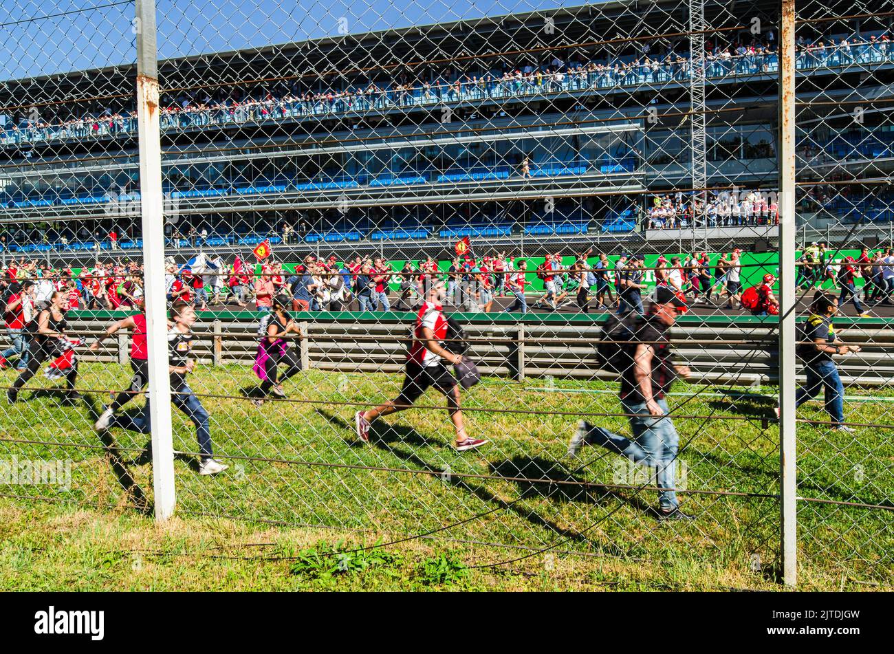 Fans invade and run around the track at the end of the 2017 Monza ...