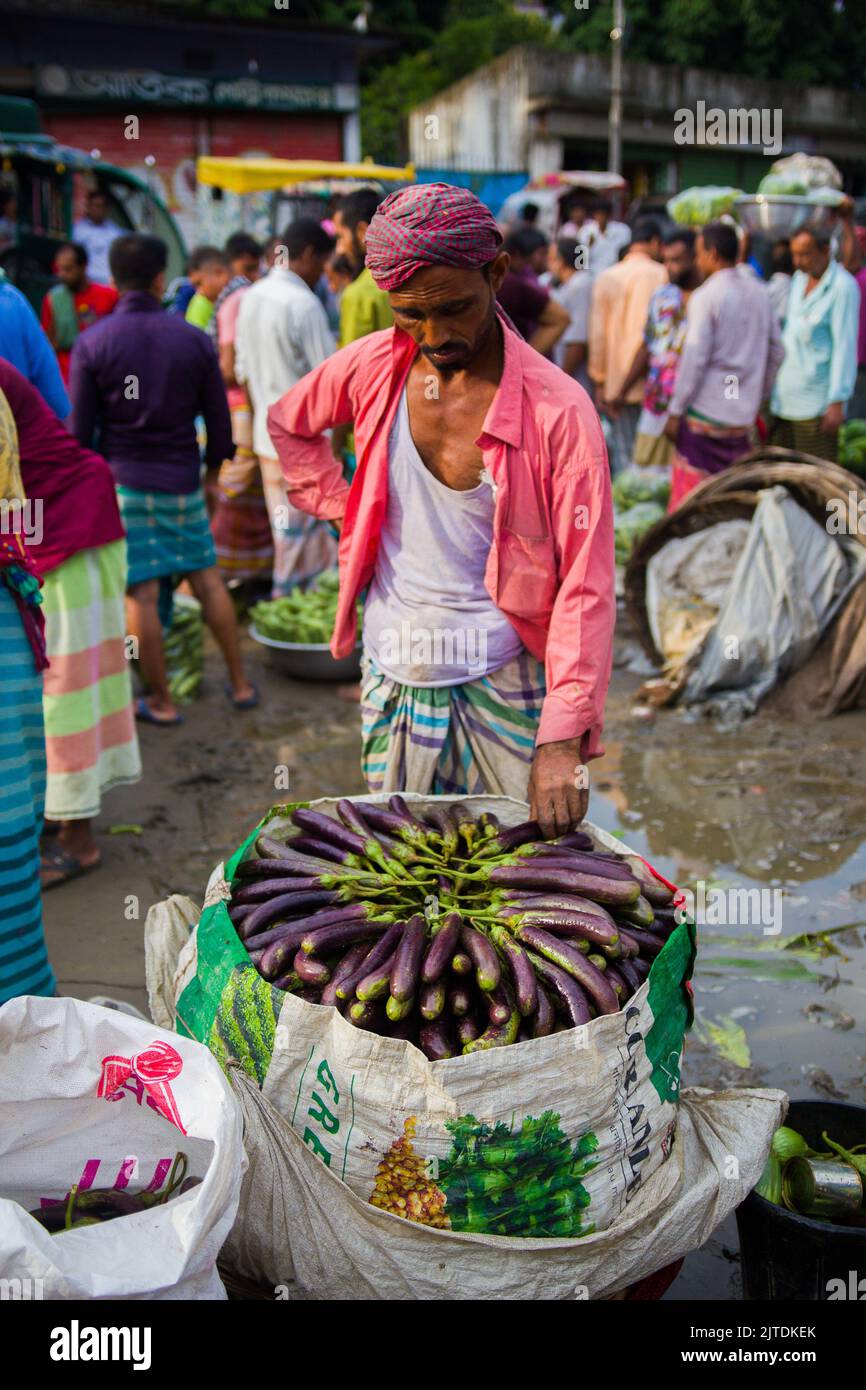 A scenery of a rural vegetable market at Kalatia, near Dhaka. Farmers ...