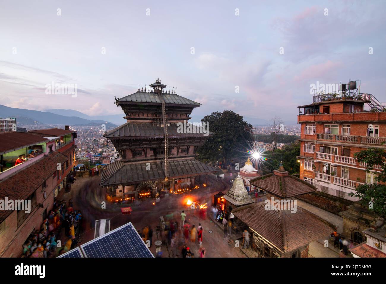 Devotees are pictured as they circumambulate Bagh Bhairab temple on the ...