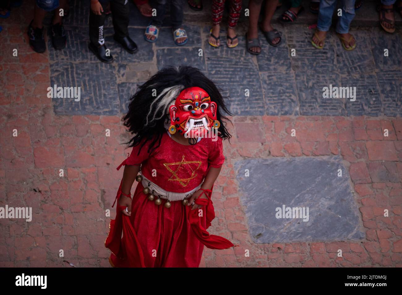 Devotees are pictured as they circumambulate Bagh Bhairab temple on the ...