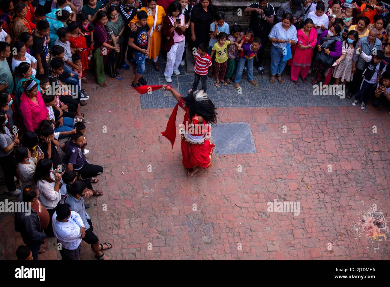 Devotees are pictured as they circumambulate Bagh Bhairab temple on the ...
