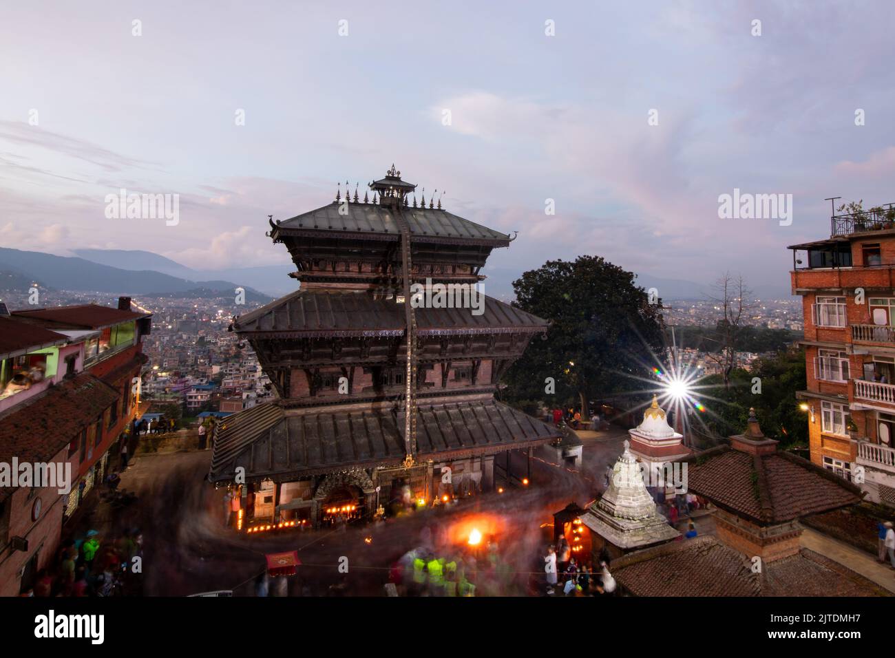 Devotees are pictured as they circumambulate Bagh Bhairab temple on the ...