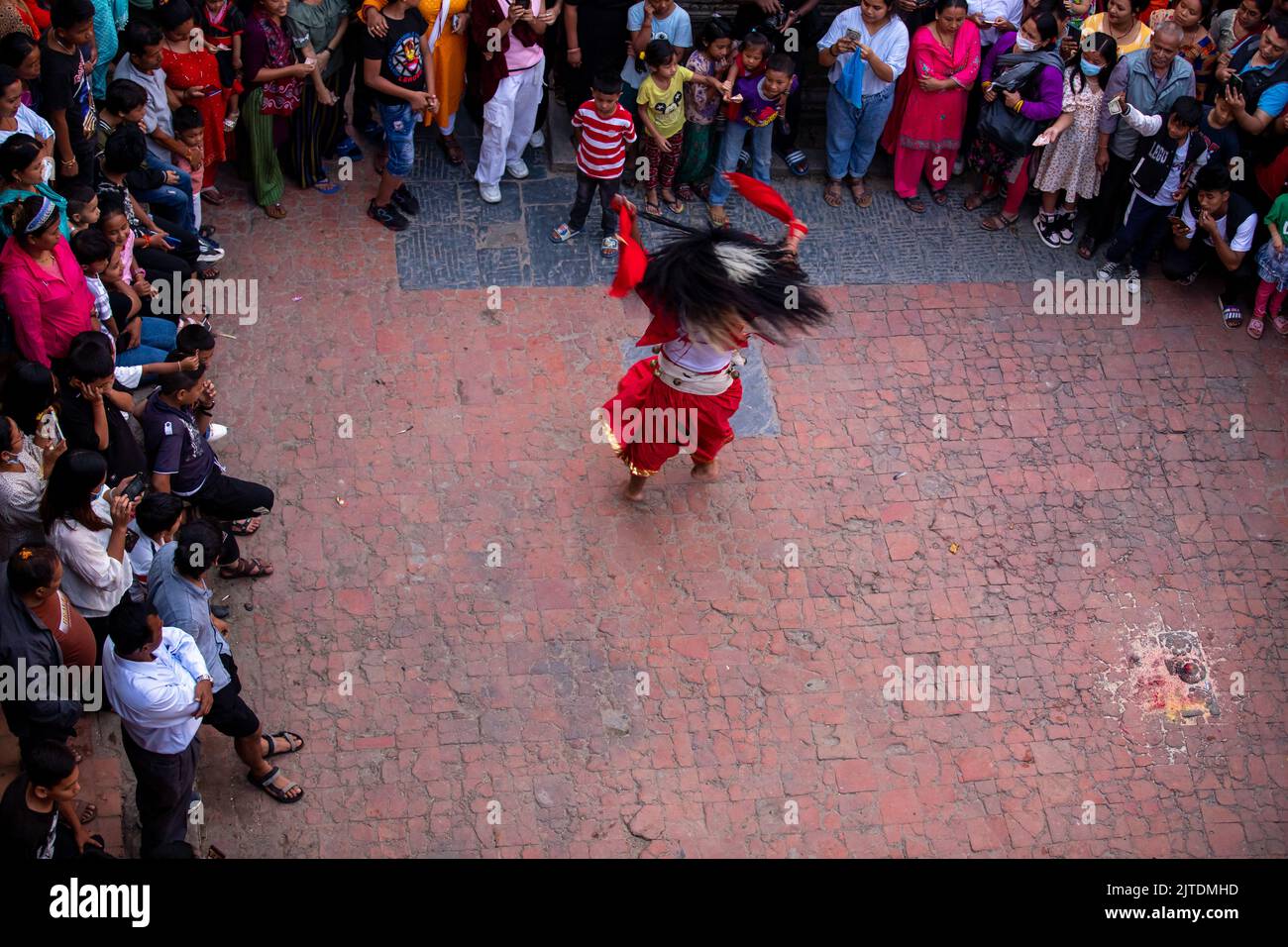 Devotees are pictured as they circumambulate Bagh Bhairab temple on the ...