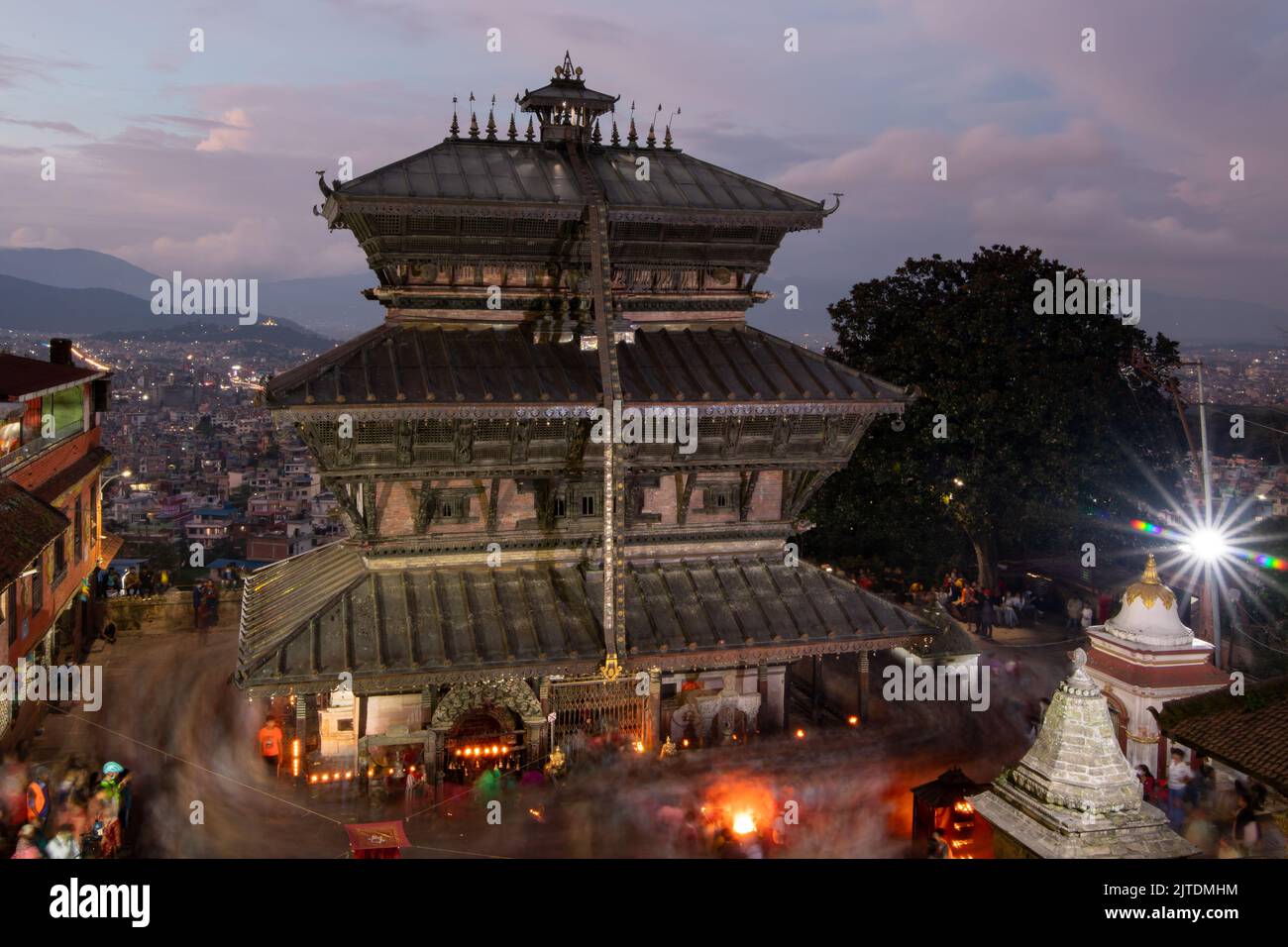 Devotees are pictured as they circumambulate Bagh Bhairab temple on the ...