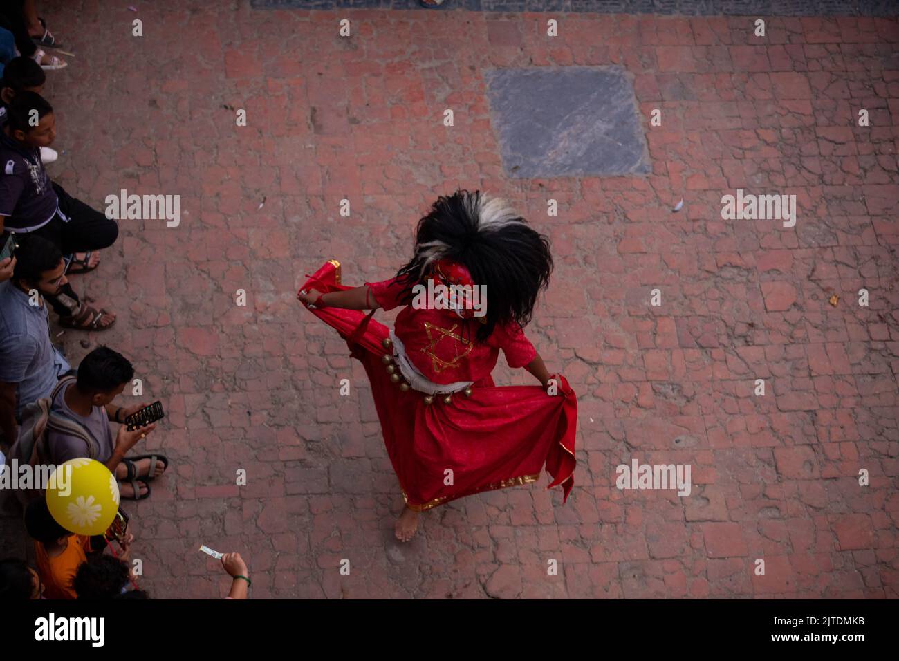 Devotees are pictured as they circumambulate Bagh Bhairab temple on the ...
