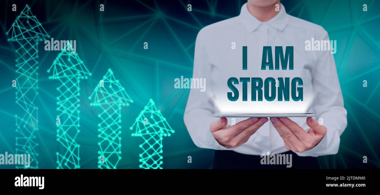Hand writing sign I Am Strong. Word Written on Have great strength ...