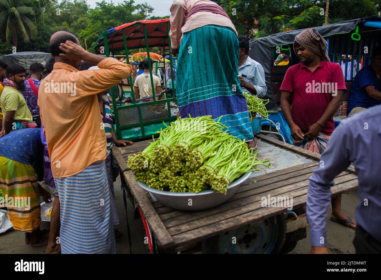 A scenery of a rural vegetable market at Kalatia, near Dhaka. Farmers ...