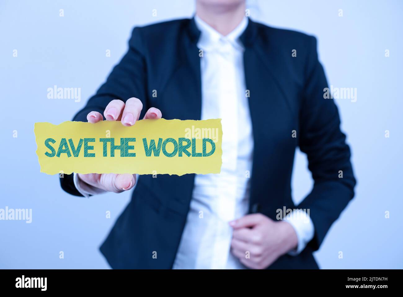 Text sign showing Save The WorldProtect the environment and the living ...