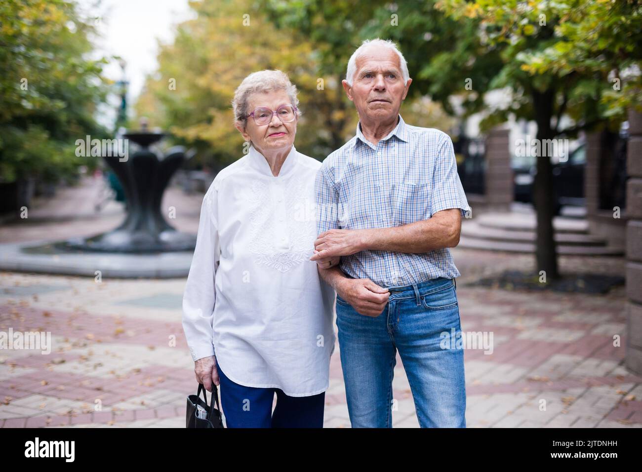 Two lovers strolling in beautiful hi-res stock photography and images ...