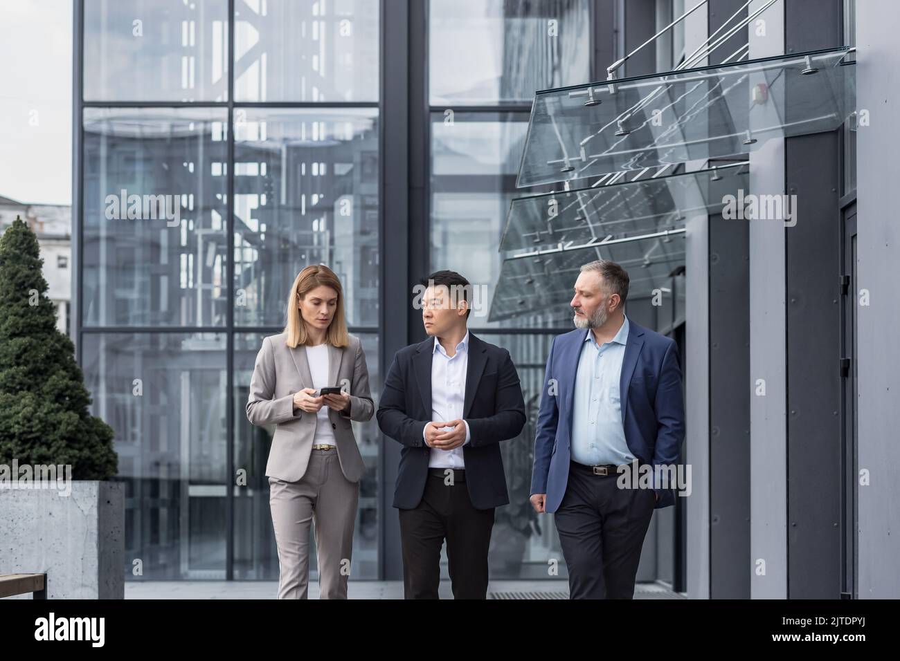 Diverse group business people walking hi-res stock photography and ...