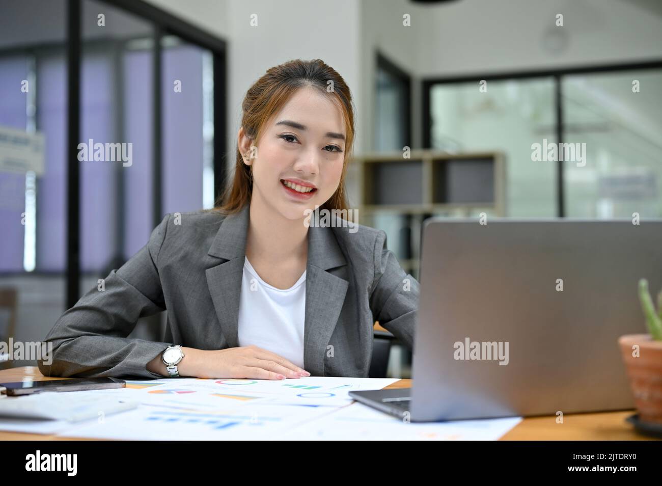 Attractive and gorgeous young Asian female businesswoman or female ...