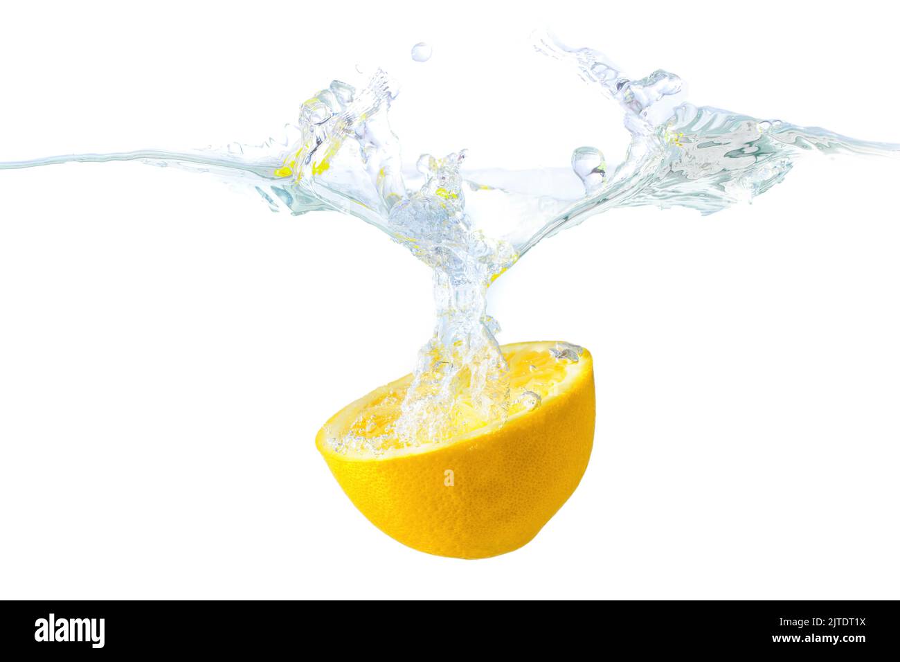 Orange half dropped in water with splashes Stock Photo - Alamy