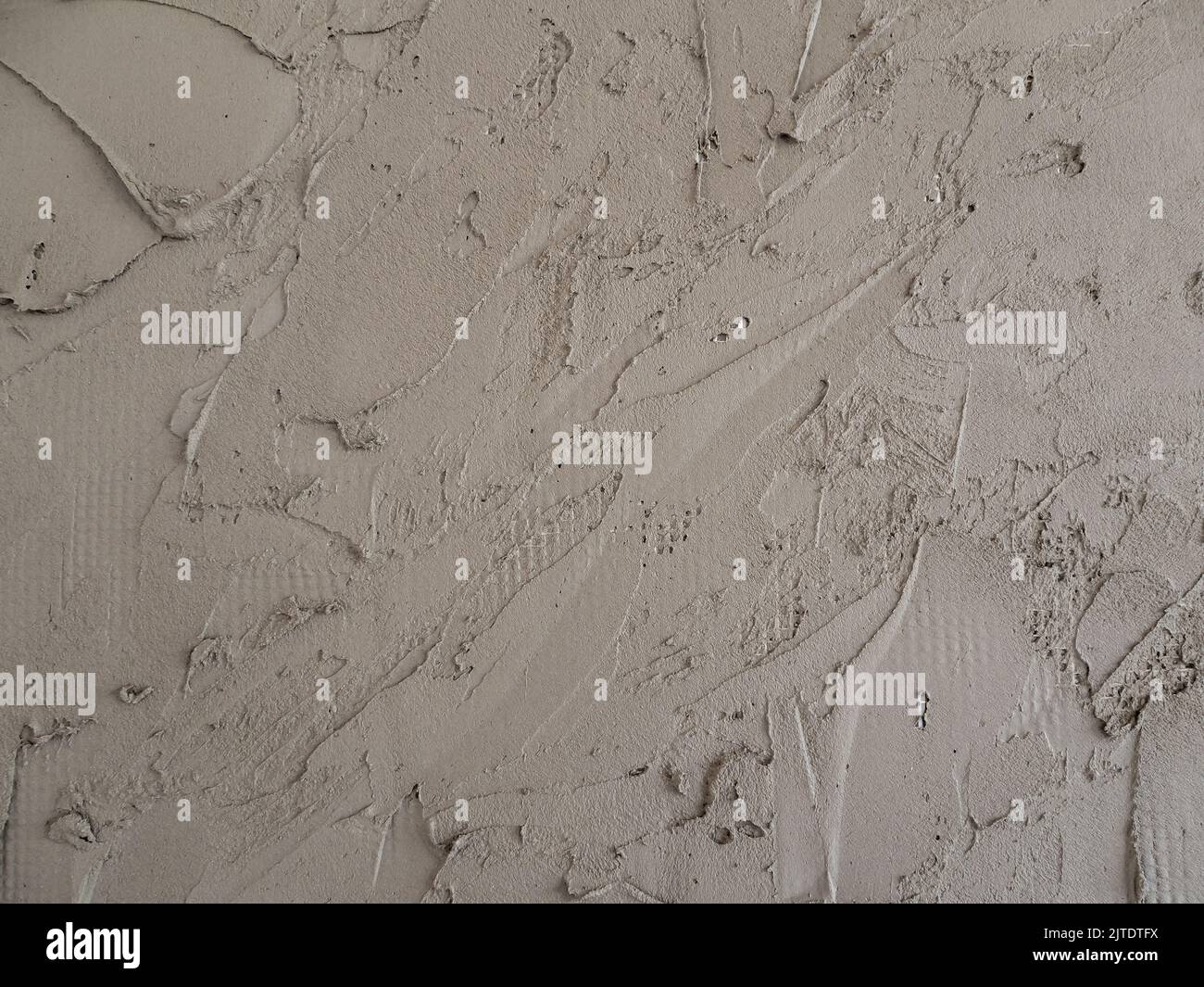 Plastering cement on a reinforcing plastic grid on a foam board Stock ...