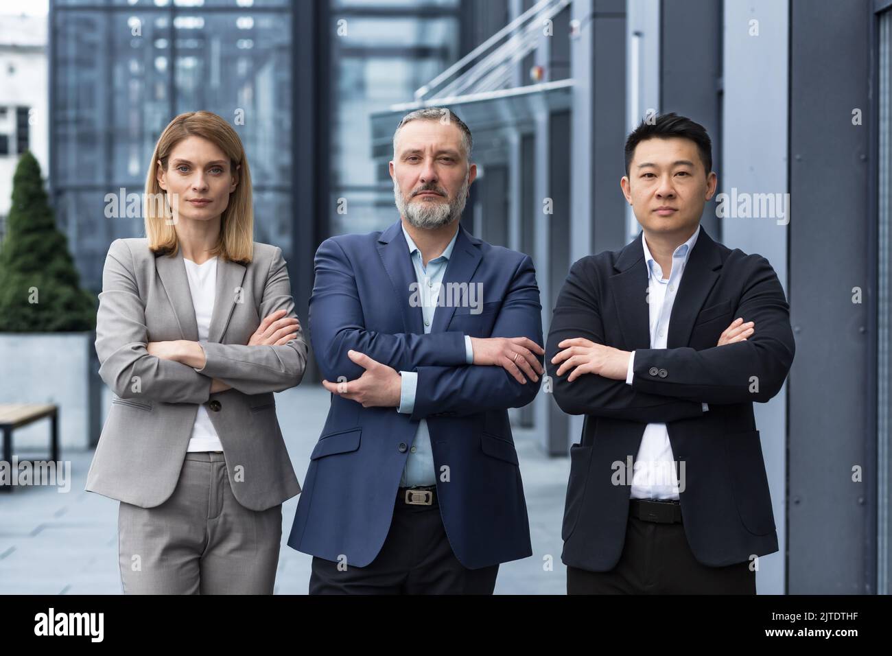 Team three successful business people hi-res stock photography and ...