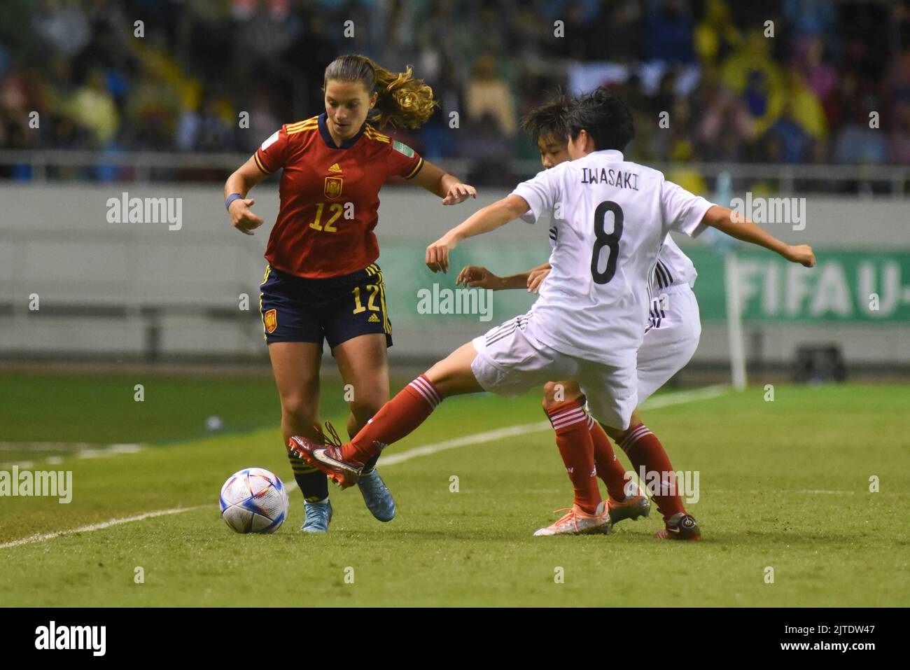 SAN JOSE, Costa Rica: Japan player Kokona IWASAKI (8) and Spain player ...