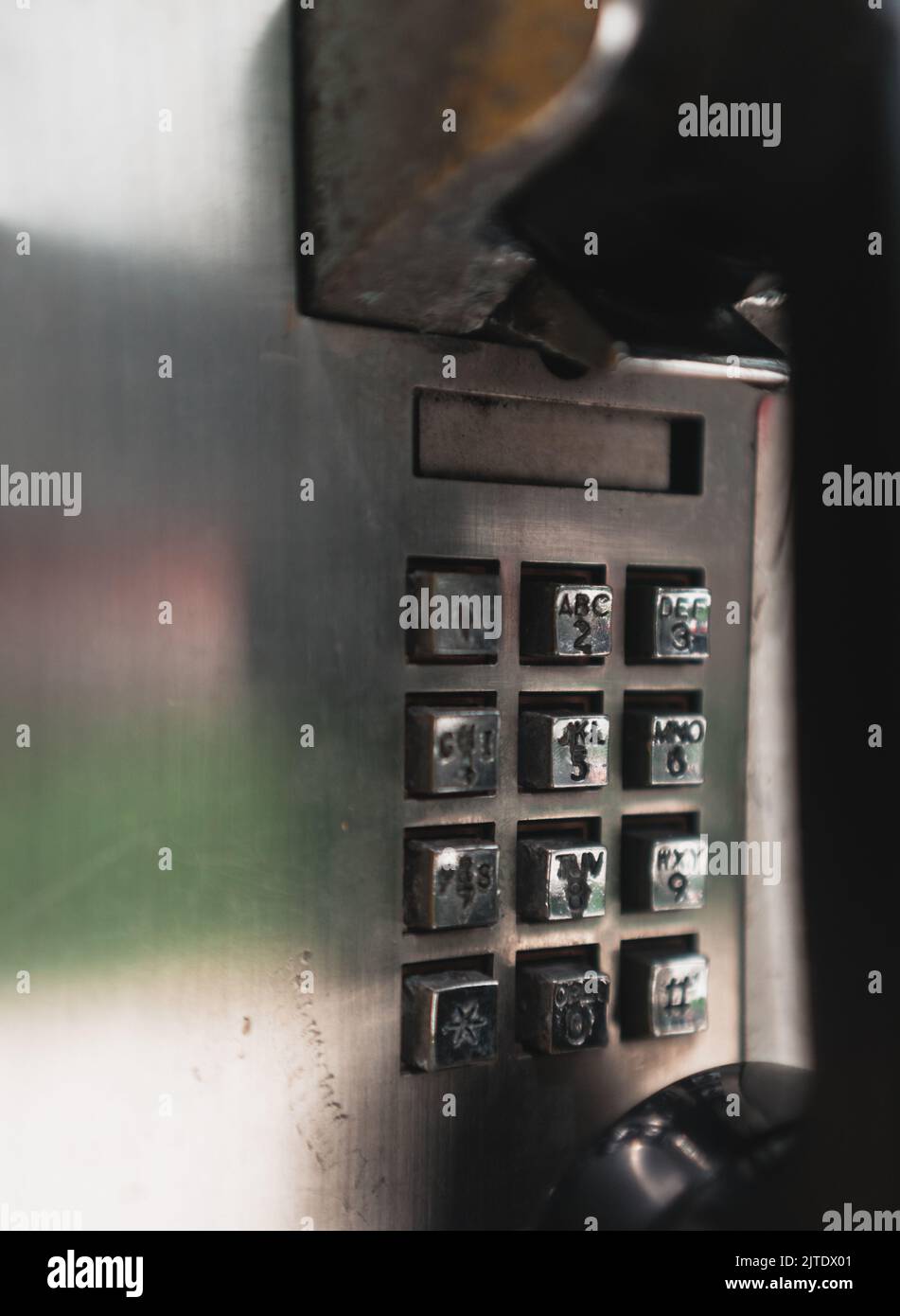 A vertical shot of a pay phone keypad Stock Photo - Alamy
