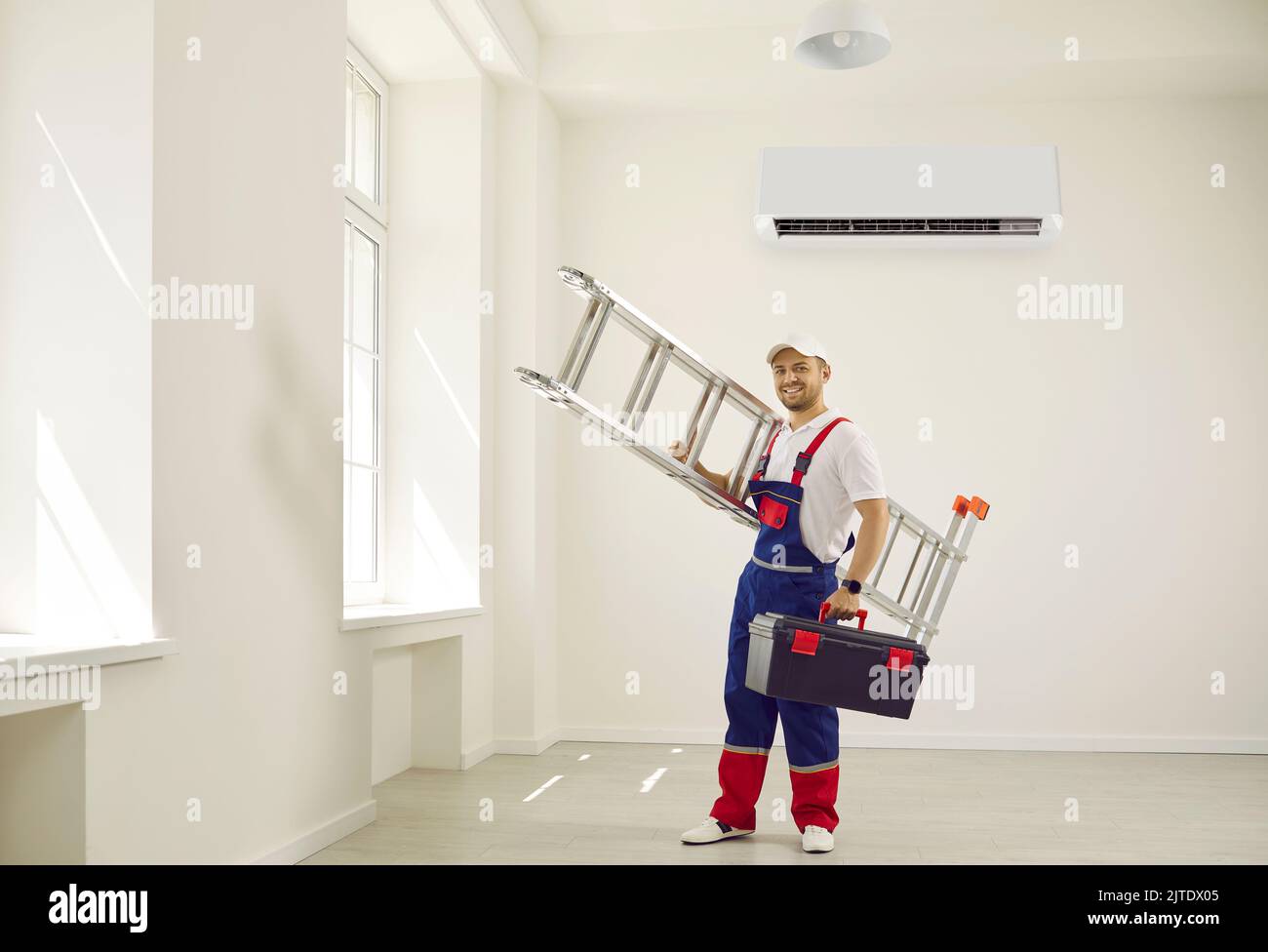 Professional installer of conditioning system who has just completed ... Professional installer of conditioning system who has just completed ...