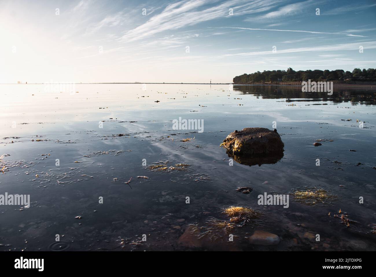 A shallow beach near with a mesmerizing landscape and skyline Stock ...