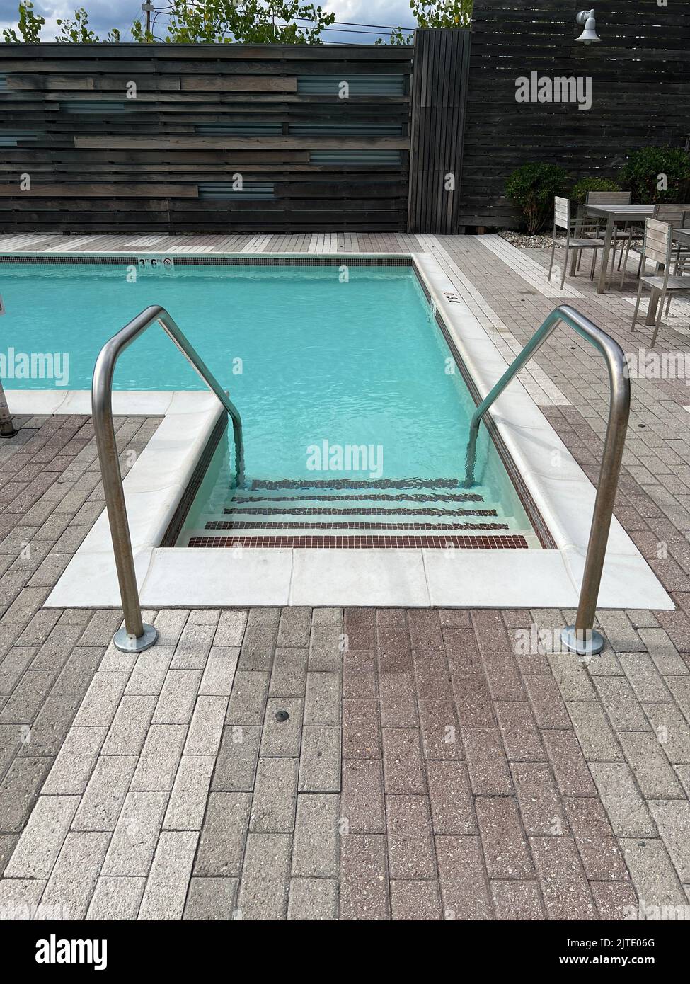 A pool with descending steps in the morning Stock Photo - Alamy