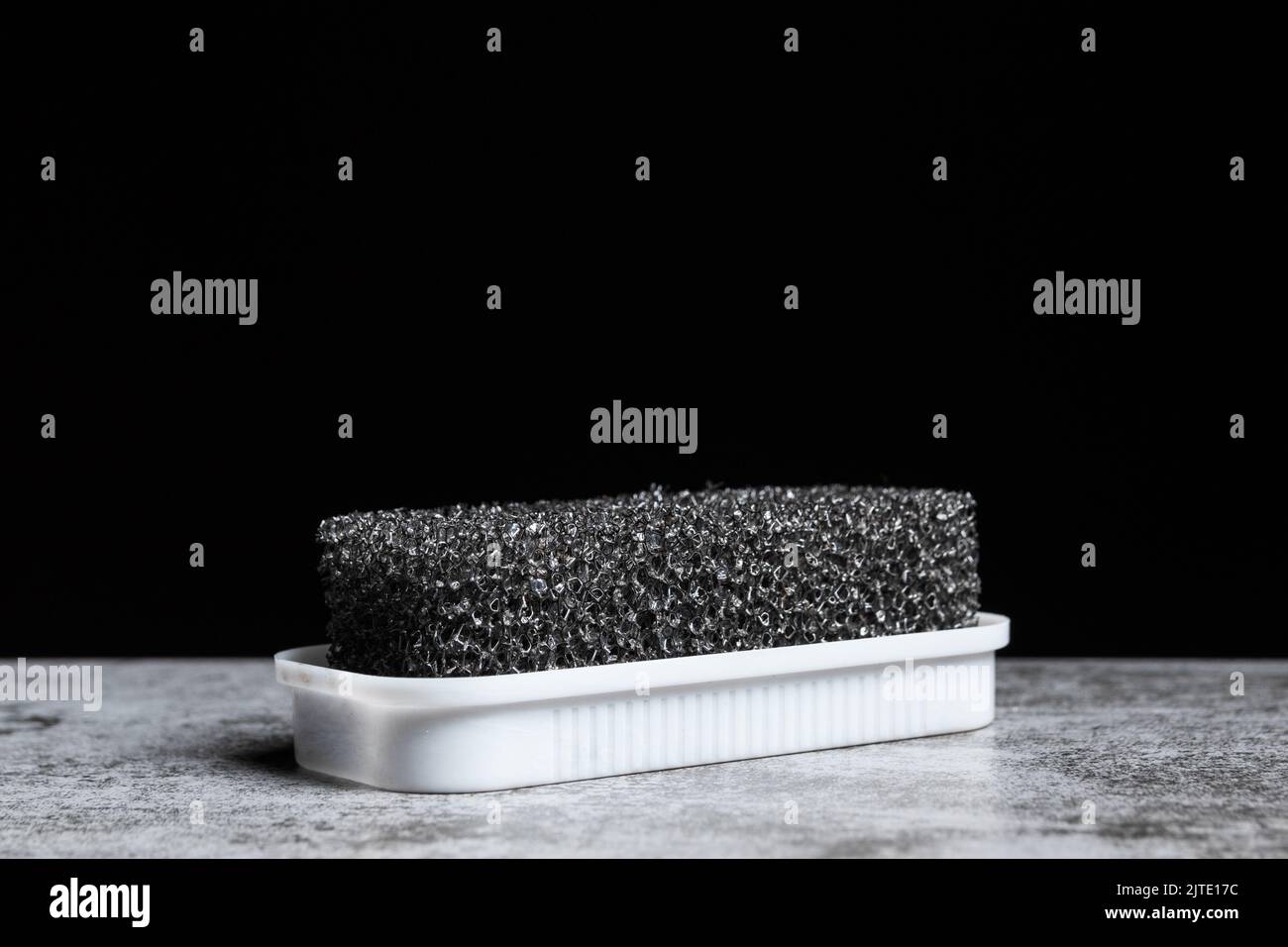 Foam sponge for suede shoes on a black background with copy space Stock ...