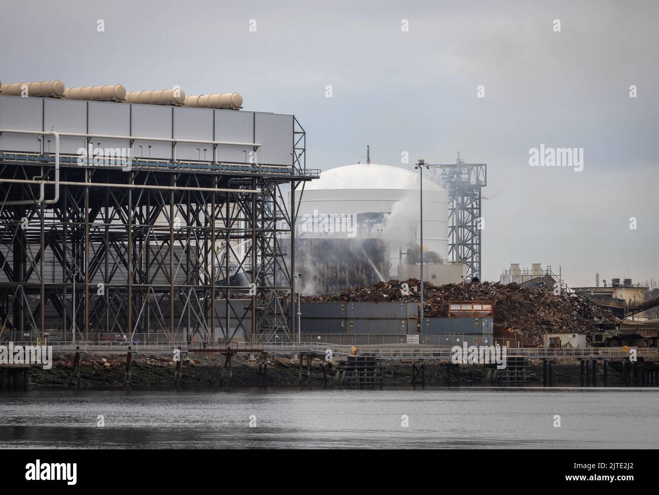 An industrial site damaged by fire Stock Photo - Alamy
