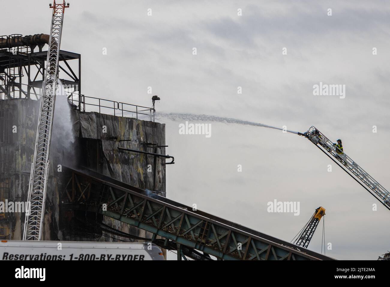 An industrial site damaged by fire Stock Photo - Alamy