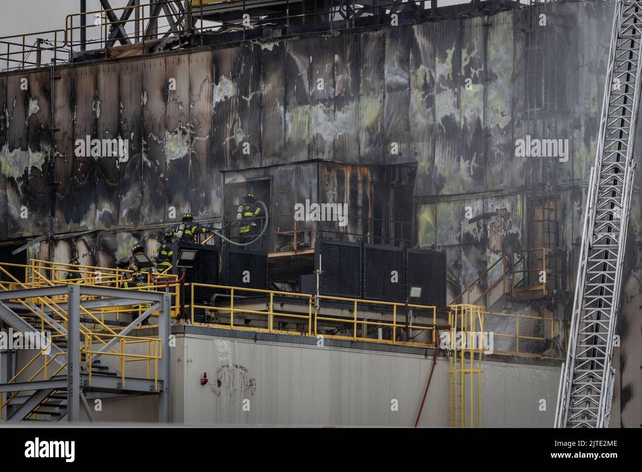 An industrial site damaged by fire Stock Photo - Alamy