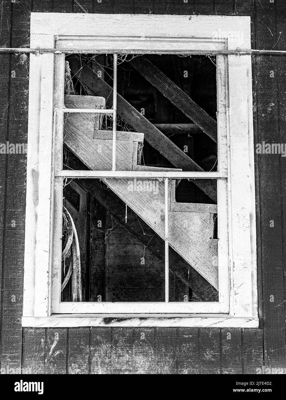 A grayscale window view of stairs Stock Photo - Alamy