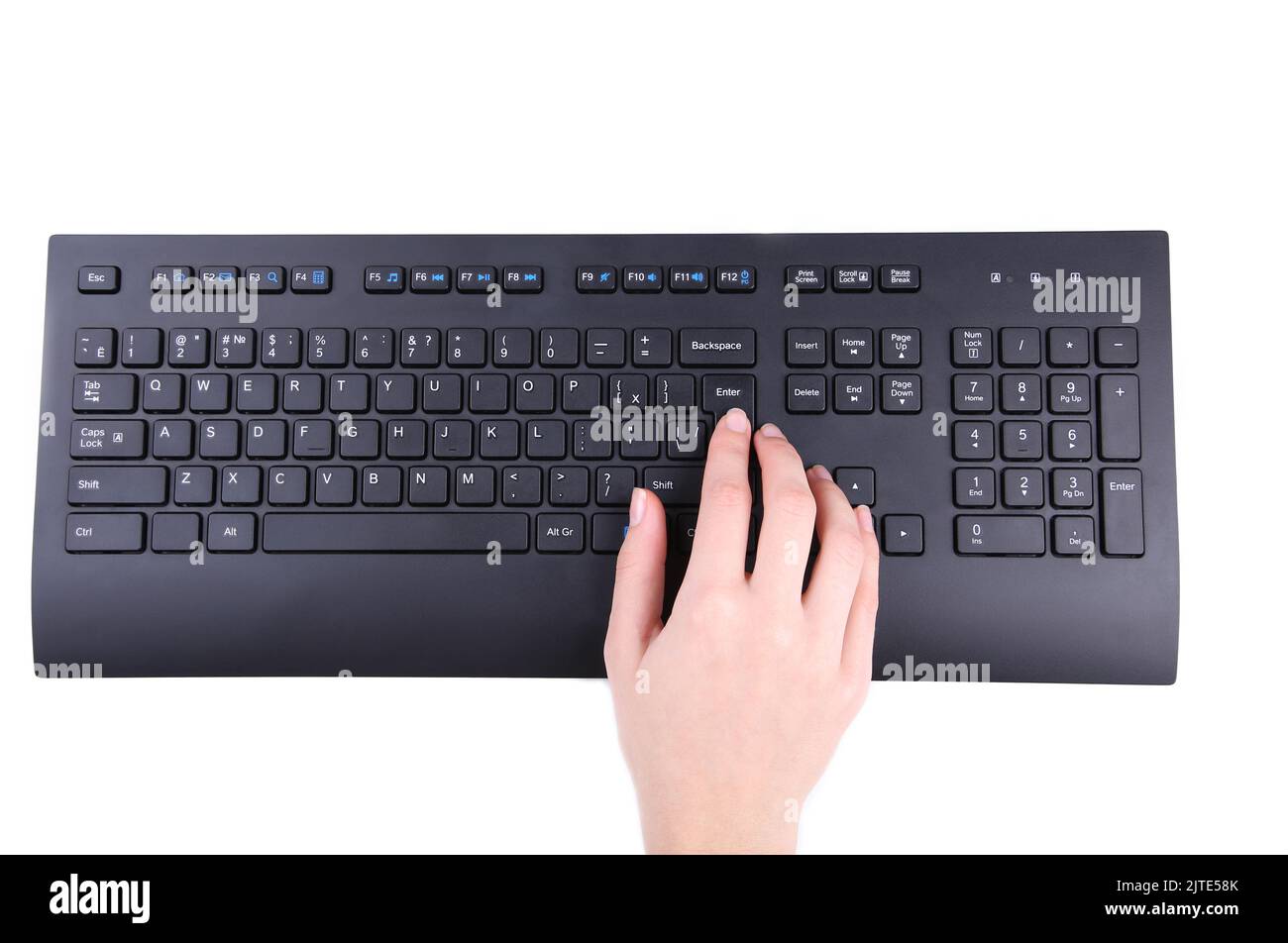 Female hands or woman office worker typing on the black keyboard ...