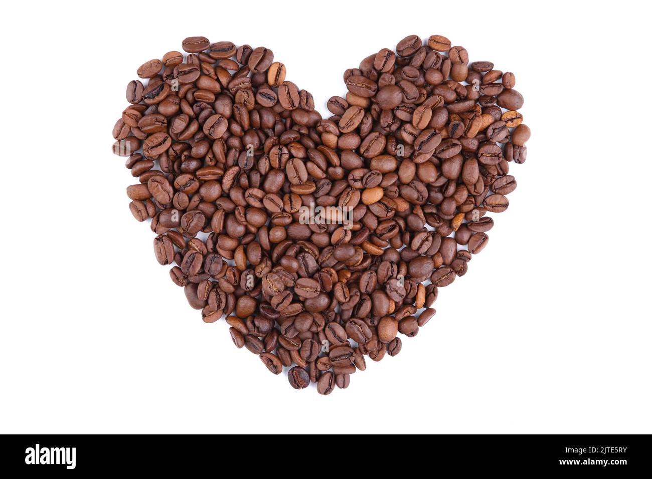 Coffee beans in shape of heart isolated on white background Stock Photo ...